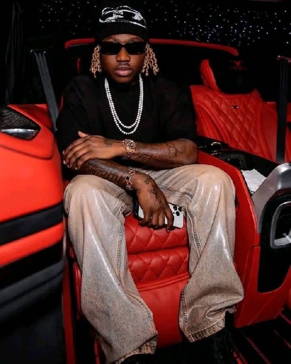 Asake responds to concerns about his bold new look and face tattoos